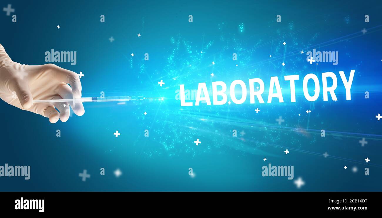 Syringe, medical injection in hand with LABORATORY inscription, medical ...