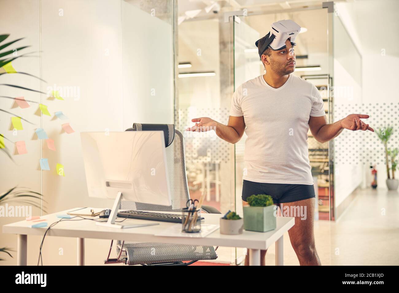 Frustrated young man trying to create new project Stock Photo - Alamy