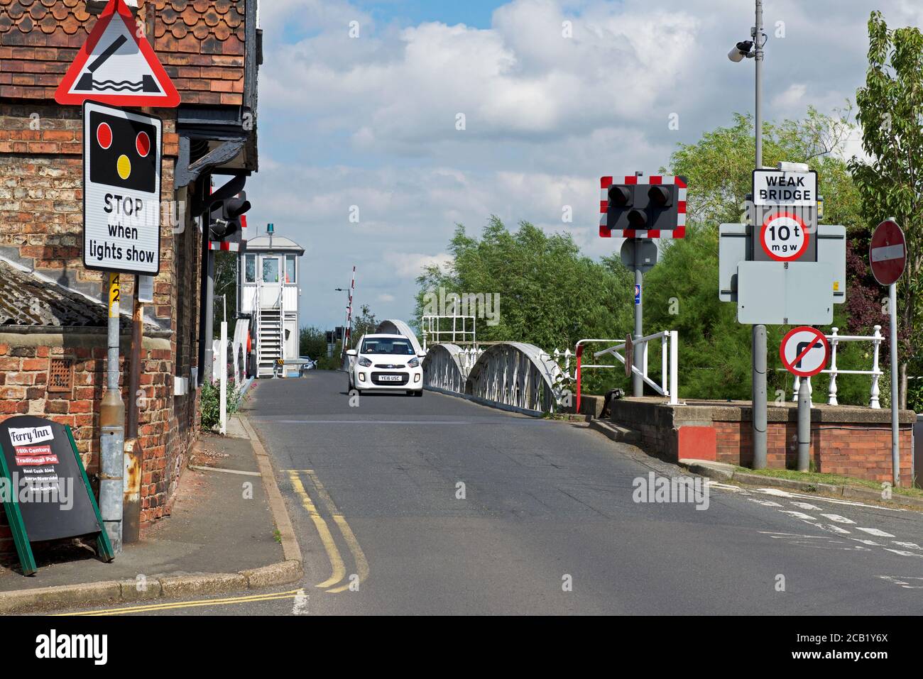 The swing bridge in the village of Cawood, North Yorkshire, England UK ...