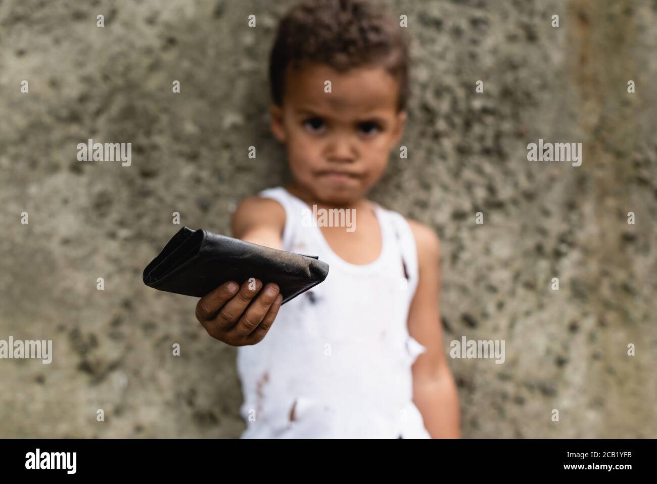 African Kid Holding Money High Resolution Stock Photography and Images ...