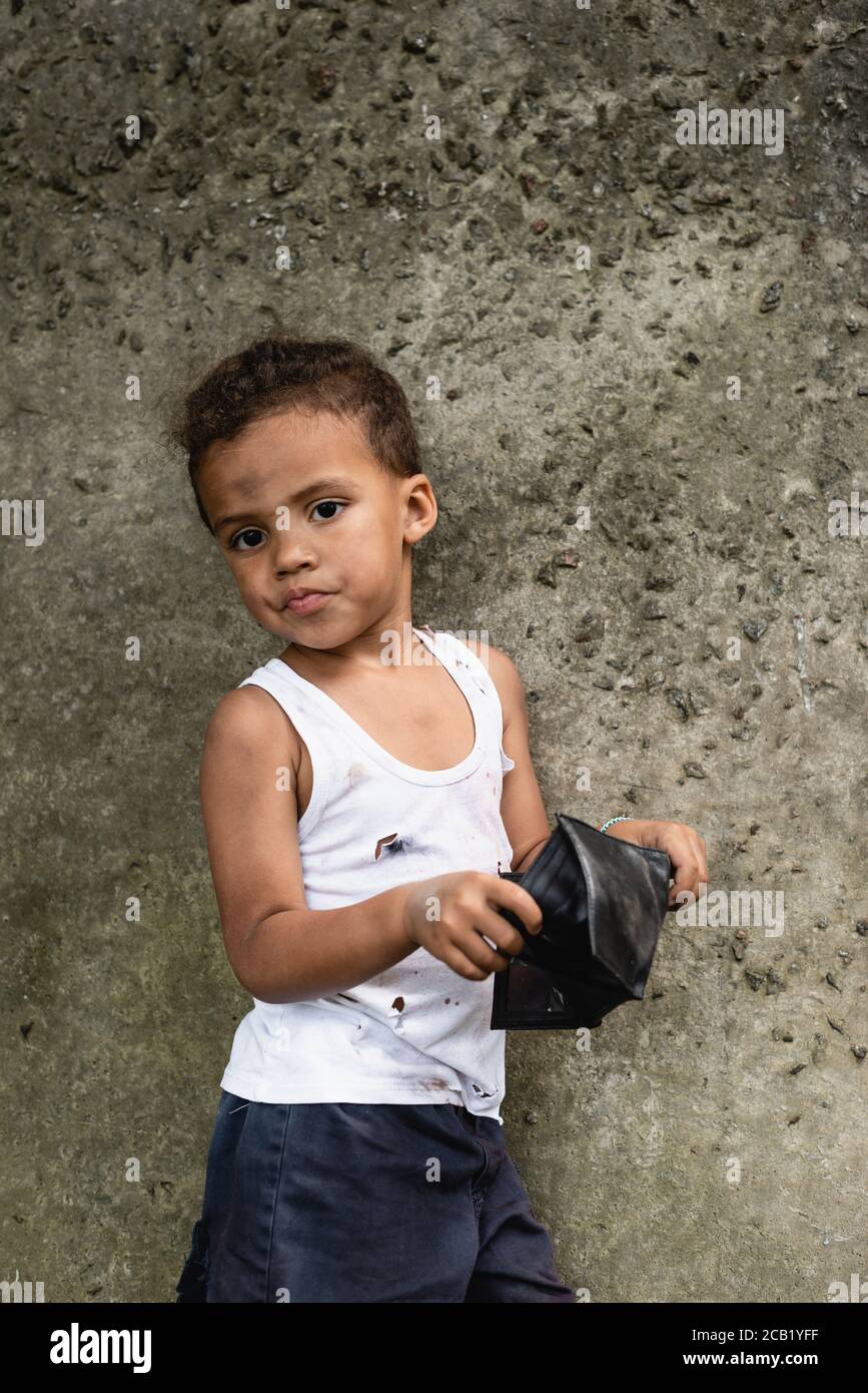African Kid Holding Money High Resolution Stock Photography and Images ...
