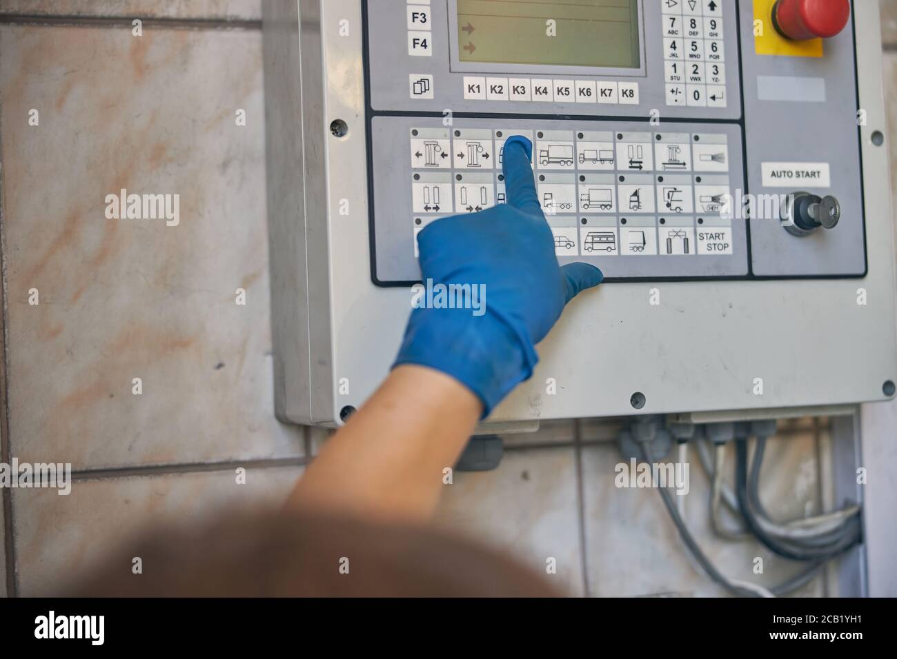 Person using remote control hi-res stock photography and images - Alamy