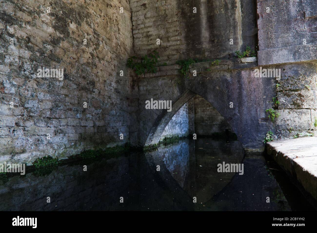 Medieval sources in the town of San Gimignano in Tuscany Stock Photo ...
