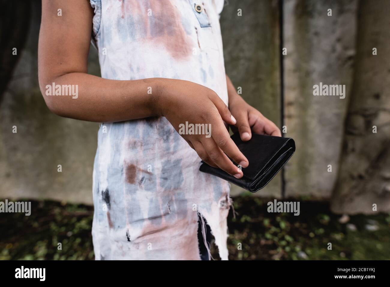 African Kid Holding Money High Resolution Stock Photography and Images ...