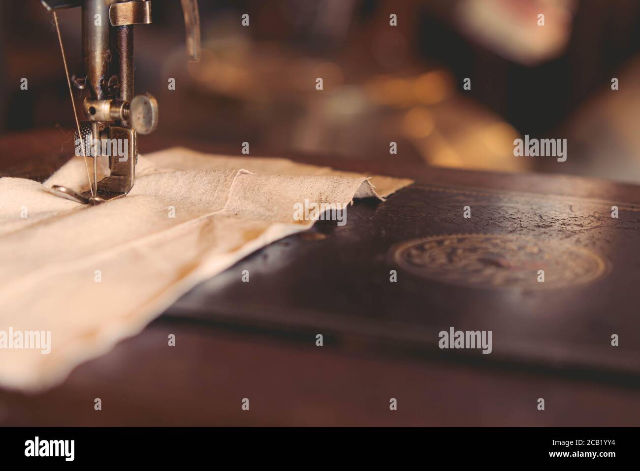 Selective focus of sewing machine needle with thread. Sewing machine ...