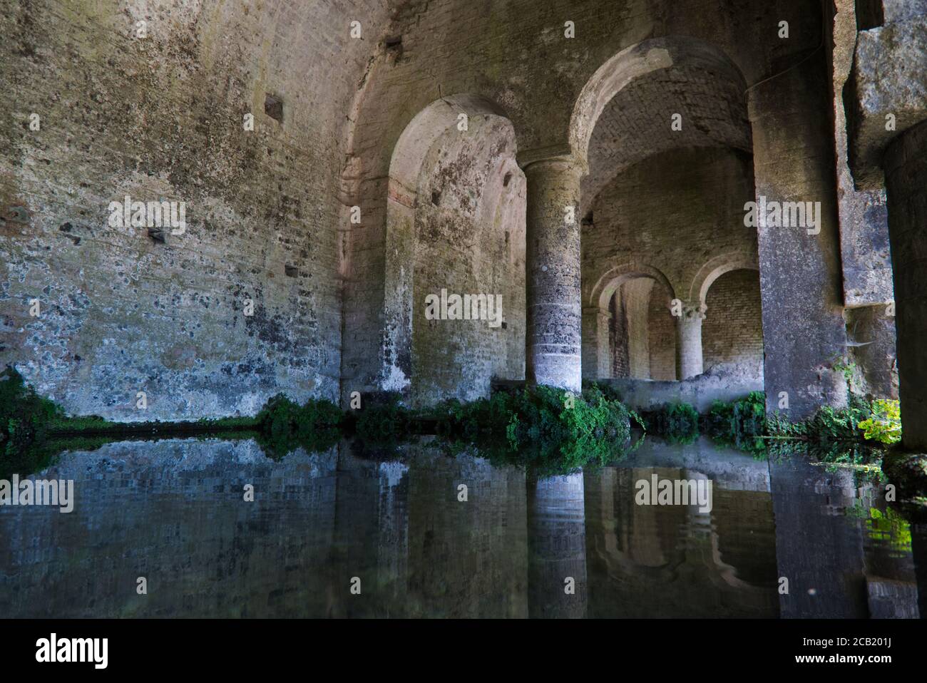 Medieval sources in the town of San Gimignano in Tuscany Stock Photo ...