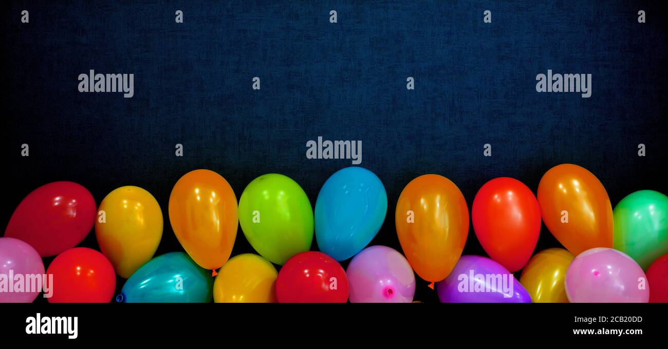 colorful balloons on blue background, minimal idea creative concept ...