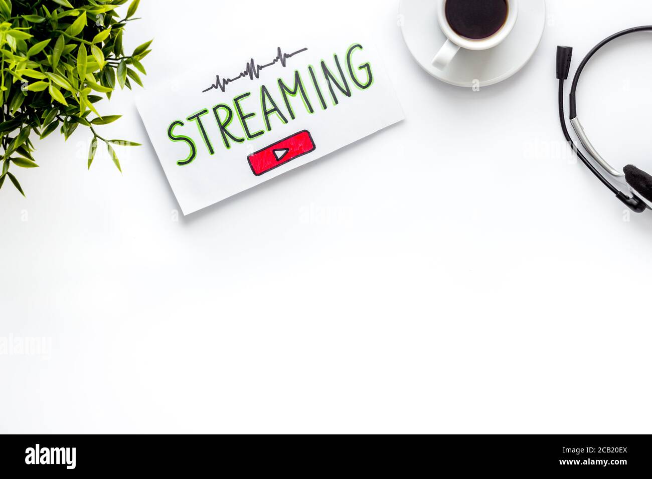 Online streaming social media concept. Paper tablet on office desk top ...