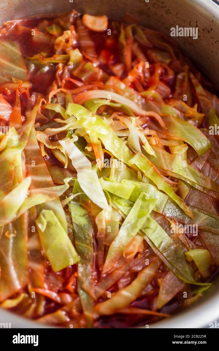 Cooking borscht in electric multi cooker Stock Photo - Alamy