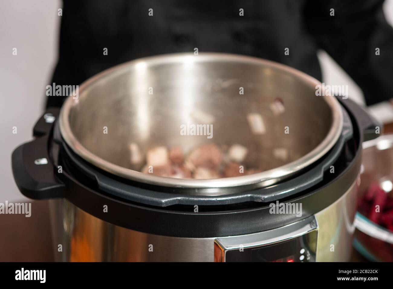 Cooking borscht in electric multi cooker Stock Photo - Alamy