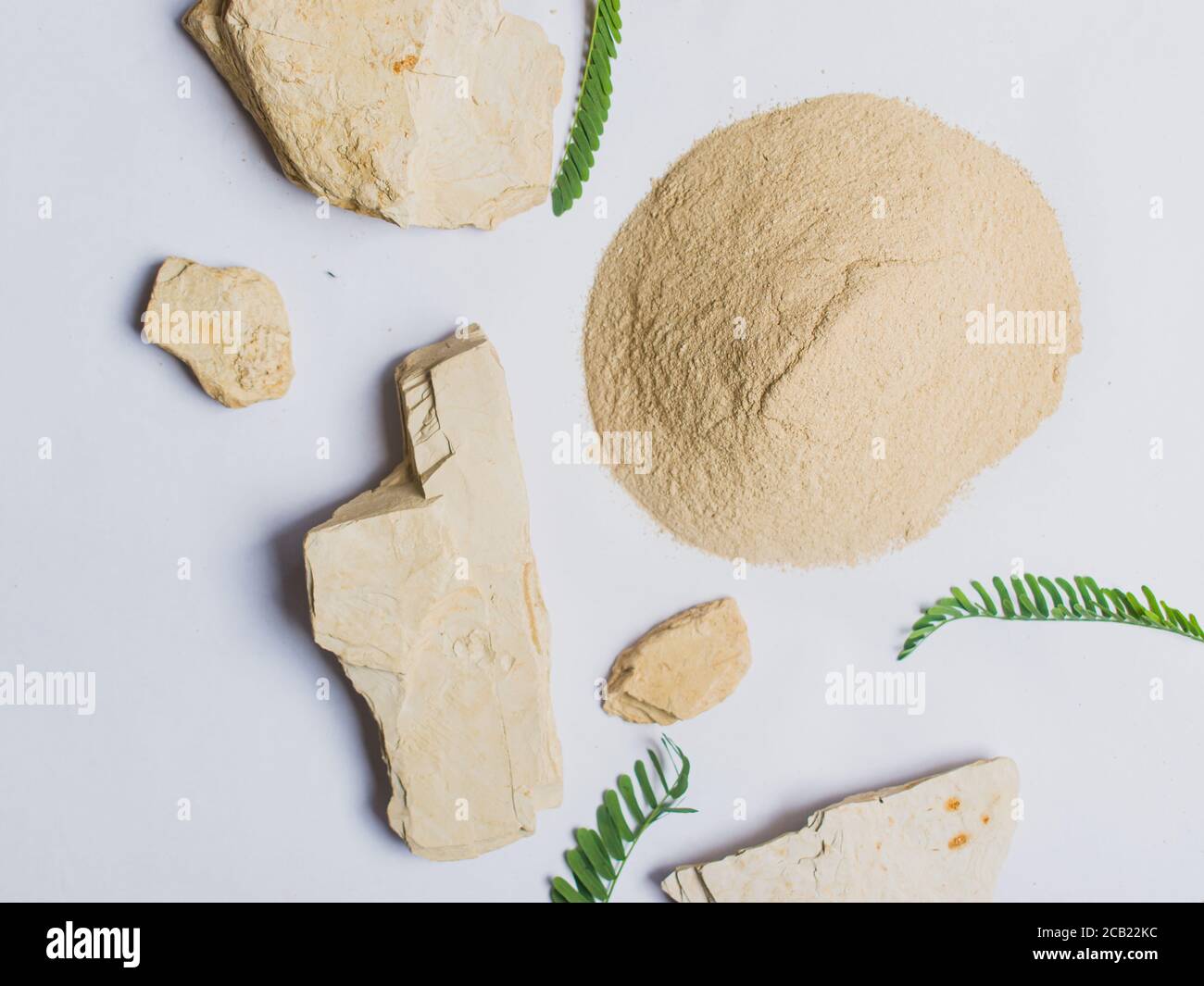 organic dry clay powder on white background. natural clay powder for ...