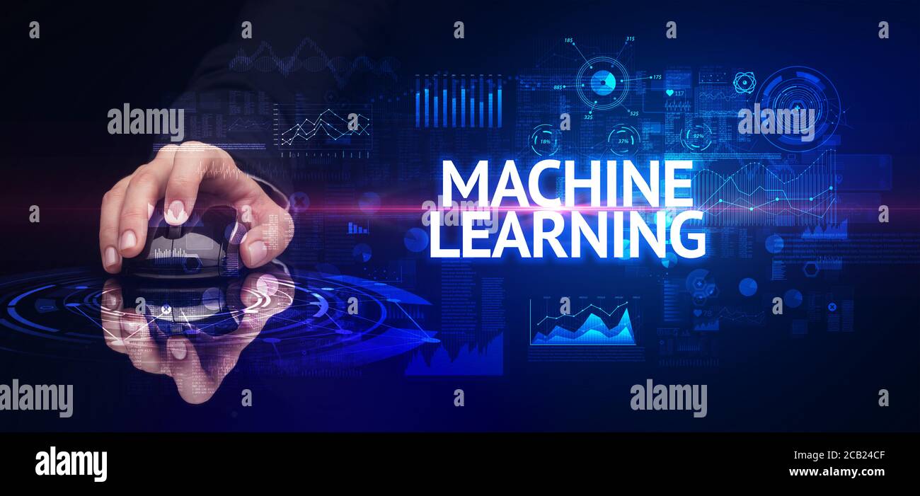 hand holding wireless peripheral with MACHINE LEARNING inscription ...