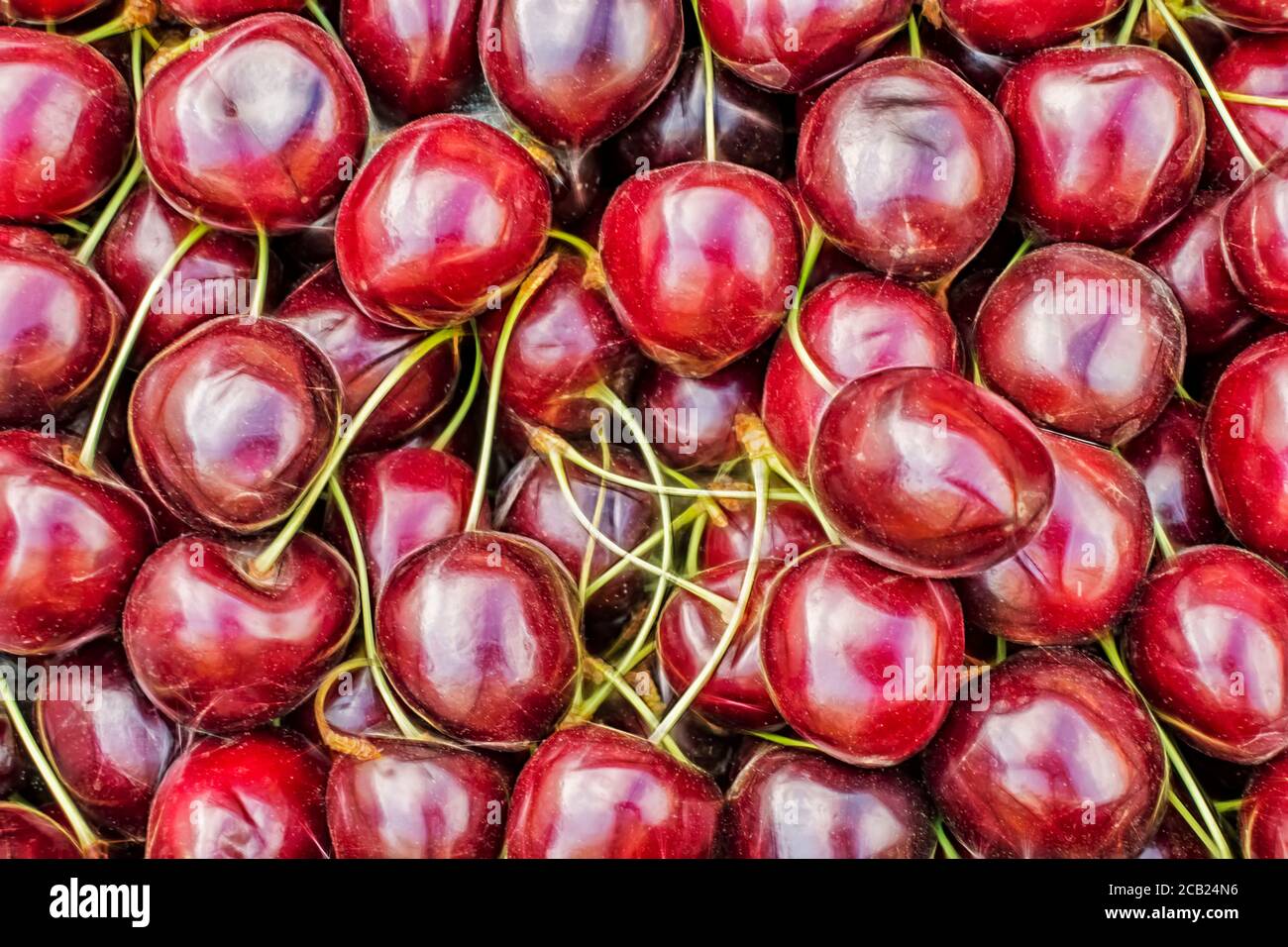 close up red sour cherries background Stock Photo - Alamy
