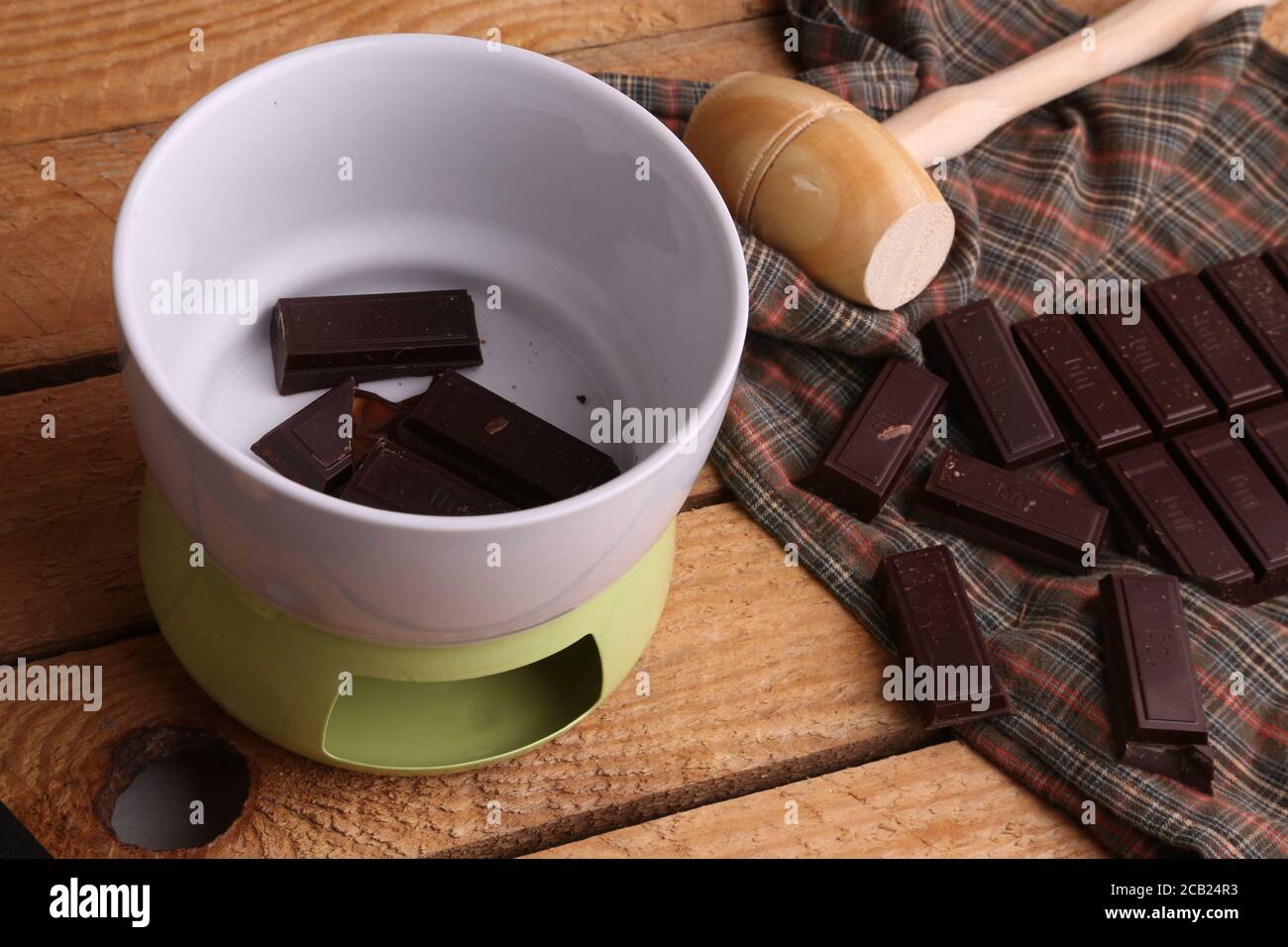Closeup of a delicious dark chocolate bar in a bowl ready to be melted ...