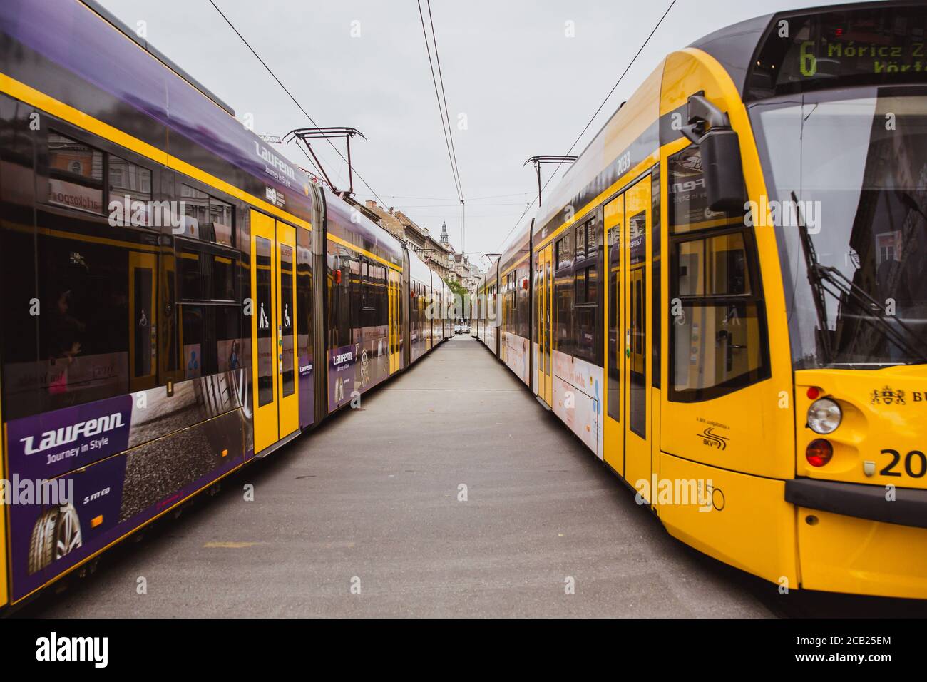 BUDAPEST, HUNGARY - SEPTEMBER 29, 2018: Yellow trams with a smile on ...