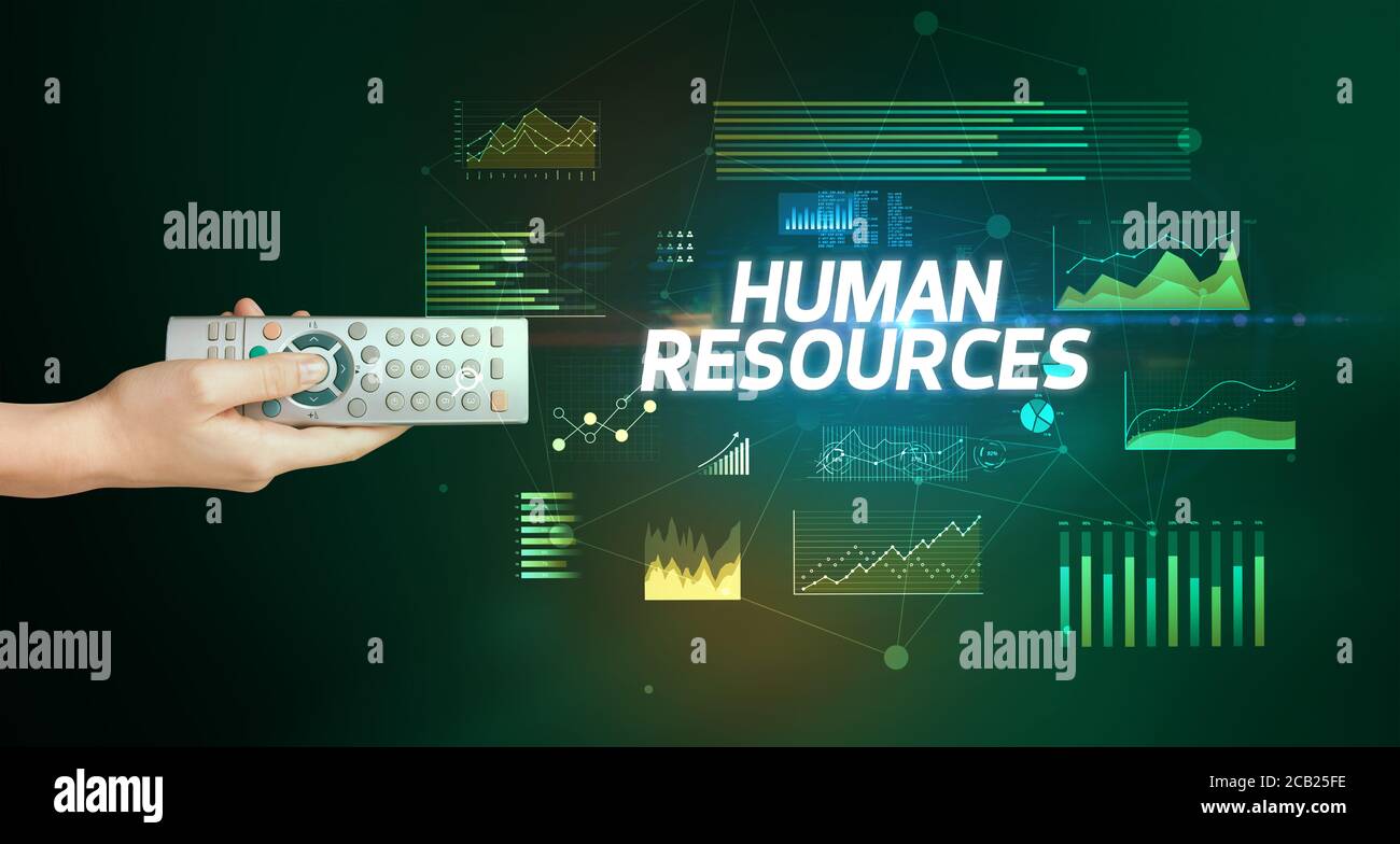 hand holding wireless peripheral with HUMAN RESOURCES inscription ...