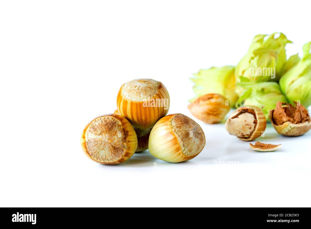Fresh green hazelnuts (cobnuts) on white background Stock Photo - Alamy