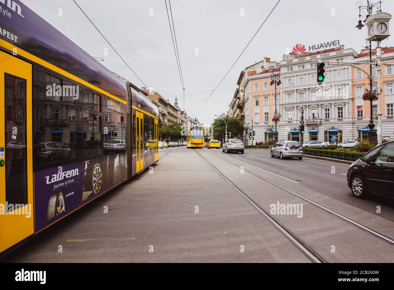 BUDAPEST, HUNGARY - SEPTEMBER 29, 2018: Yellow trams with a smile on ...
