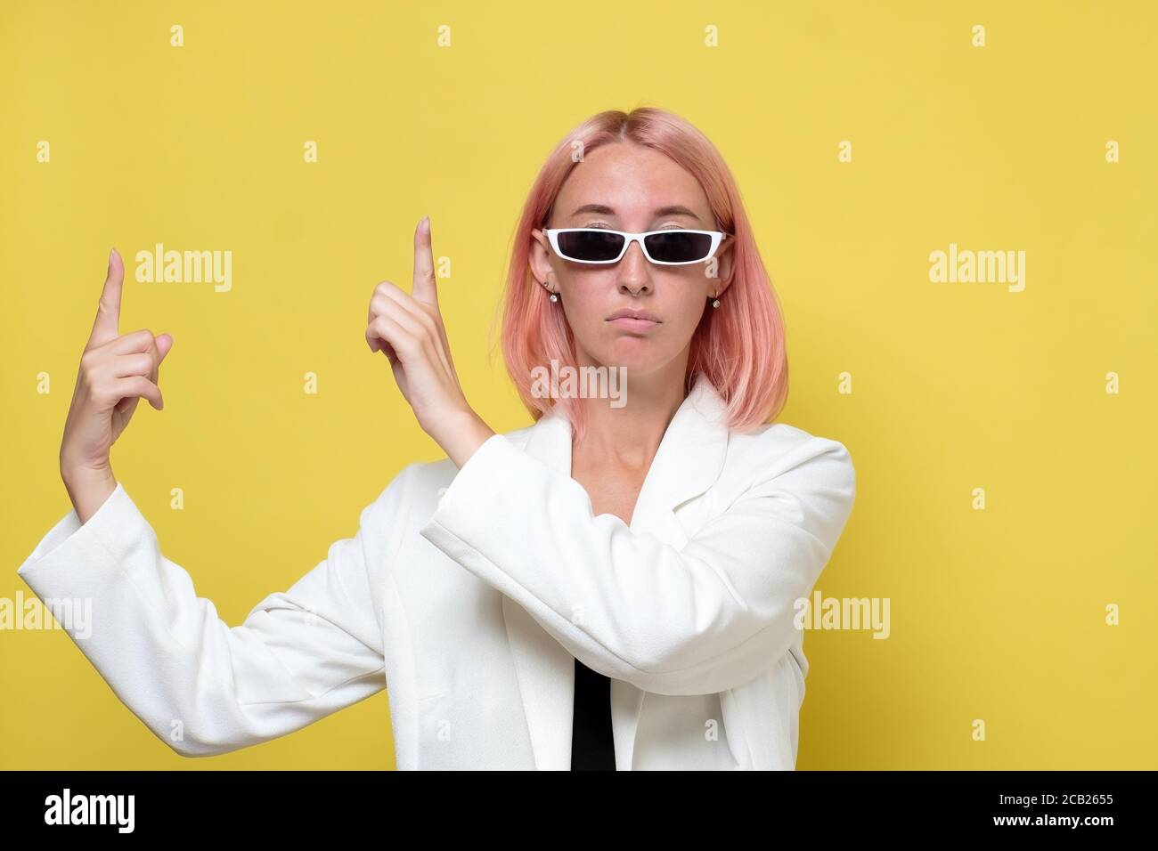 Woman finger pointing nose hi-res stock photography and images - Alamy