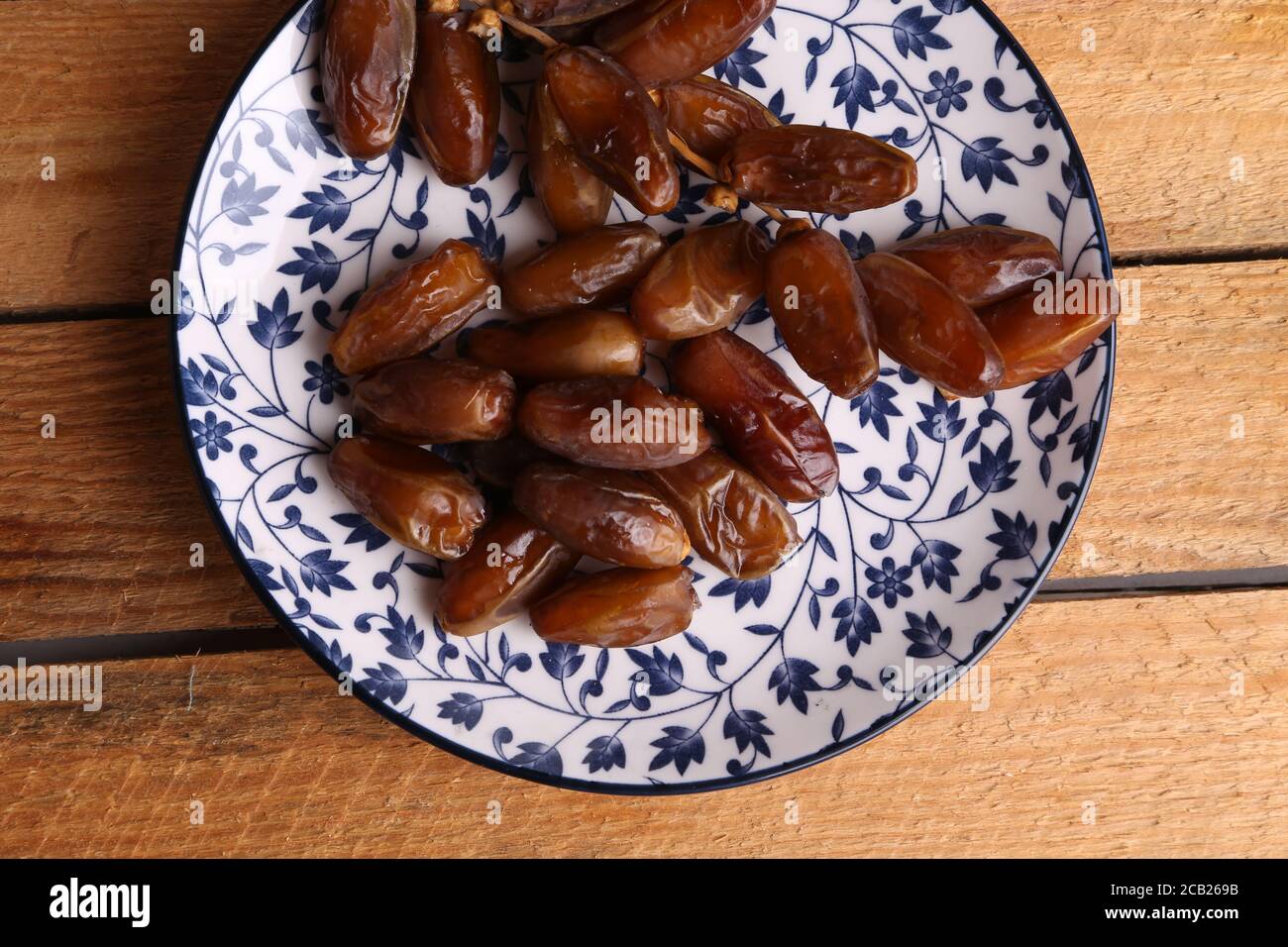 Closeup shot of Moroccan dates in color background Stock Photo - Alamy