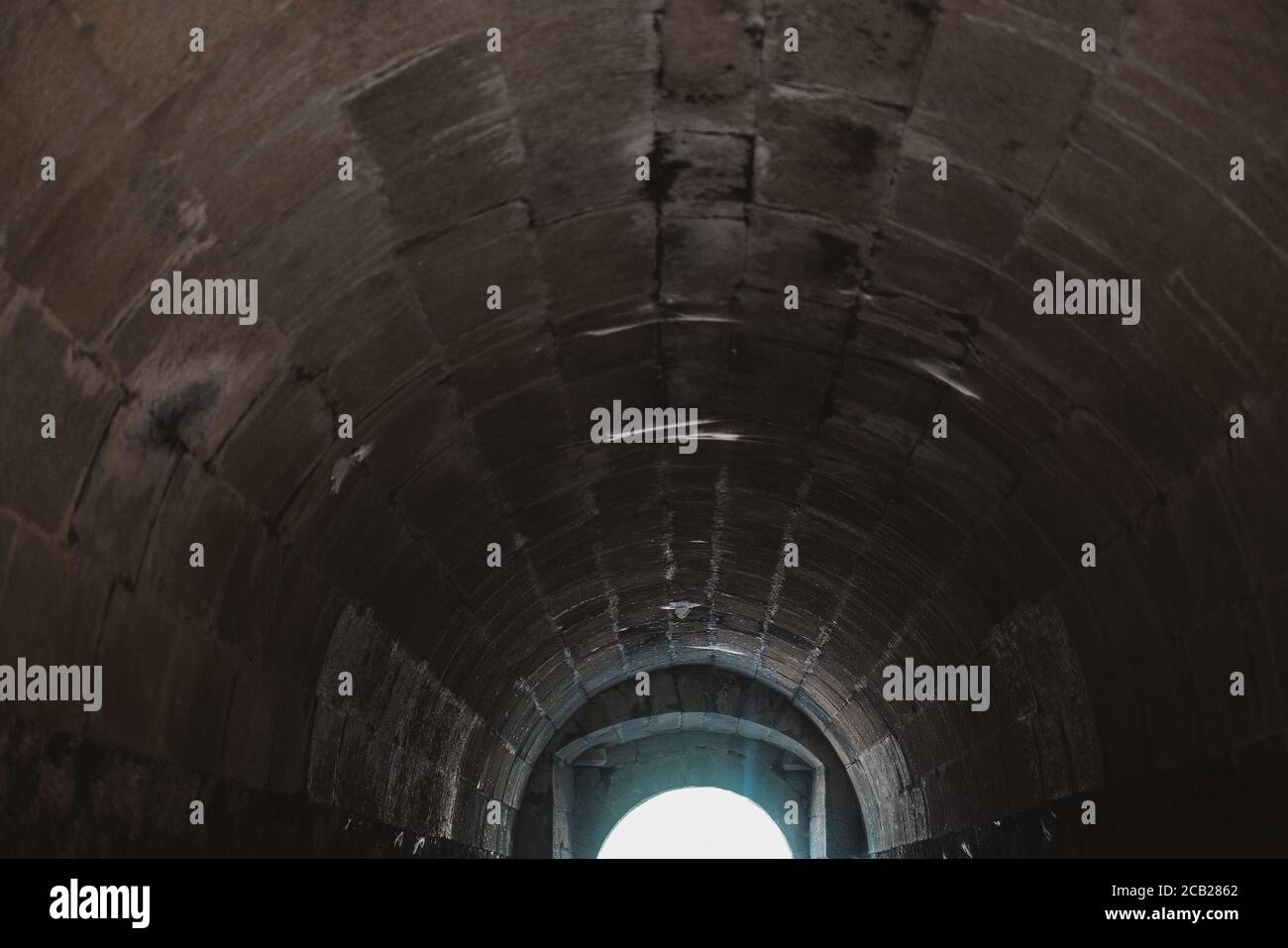 Low angle shot of an inside of a stone tunnel in Portugal Stock Photo ...
