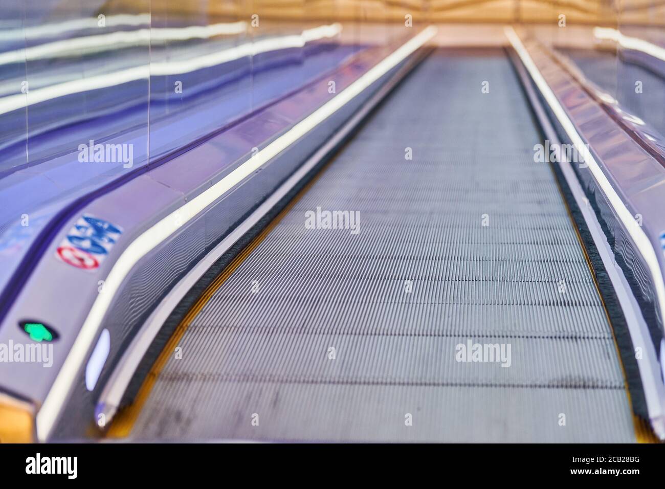 Moving walkway in shopping center. Horizontal slow-moving conveyor ...