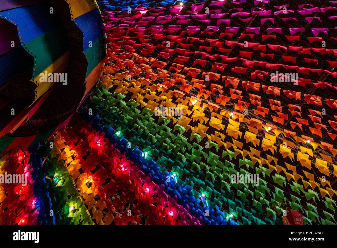 Traditional party with colourful background Stock Photo - Alamy