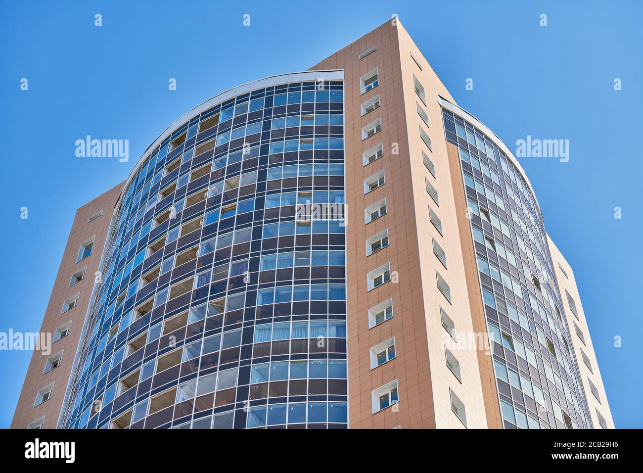 Multistorey building for rent, copy space. Multi-storey facade, living ...