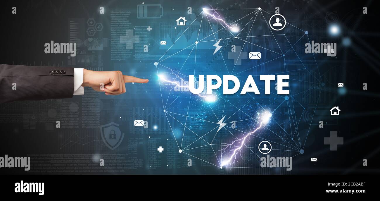 Hand pointing at UPDATE inscription, modern technology concept Stock ...