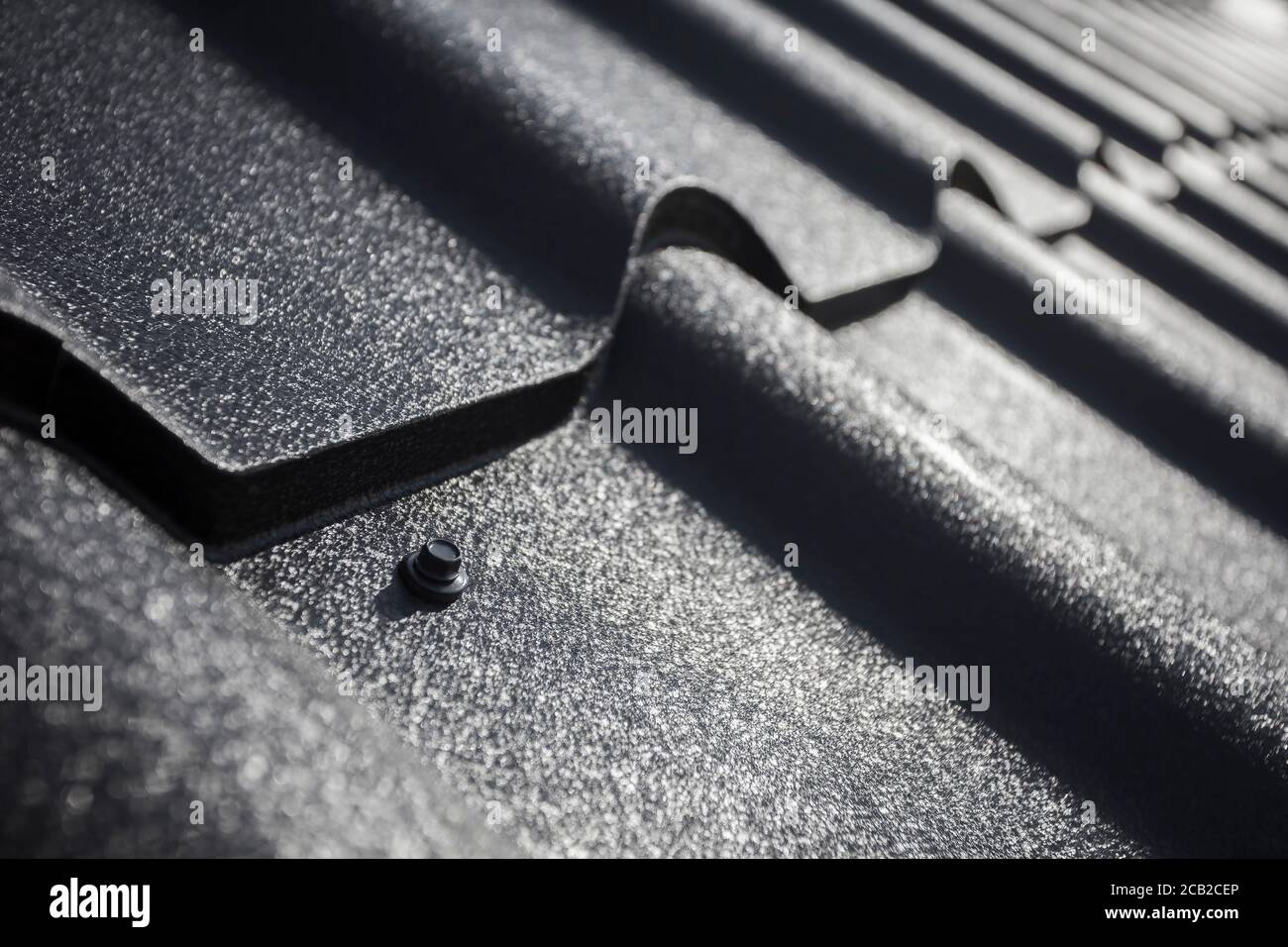 new house roof. details of screw closeup on tile Stock Photo - Alamy