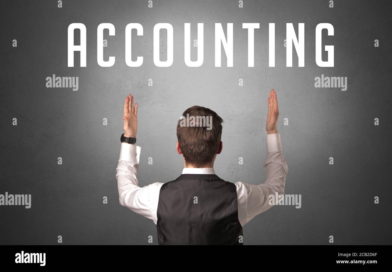 Rear view of a businessman with ACCOUNTING inscription, powerfull ...