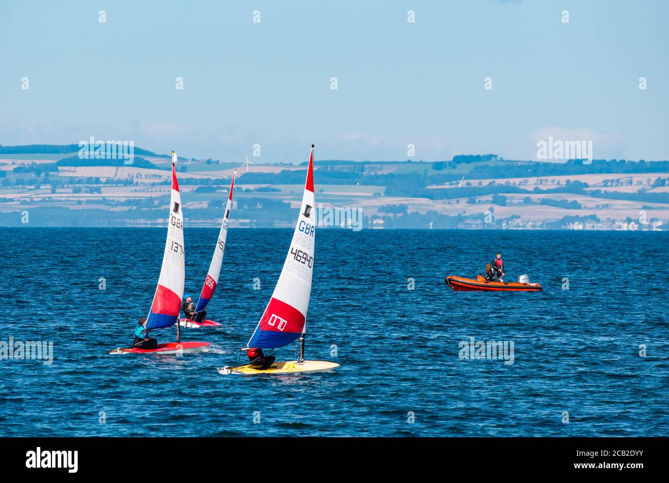 Boys in water with boat hi-res stock photography and images - Alamy