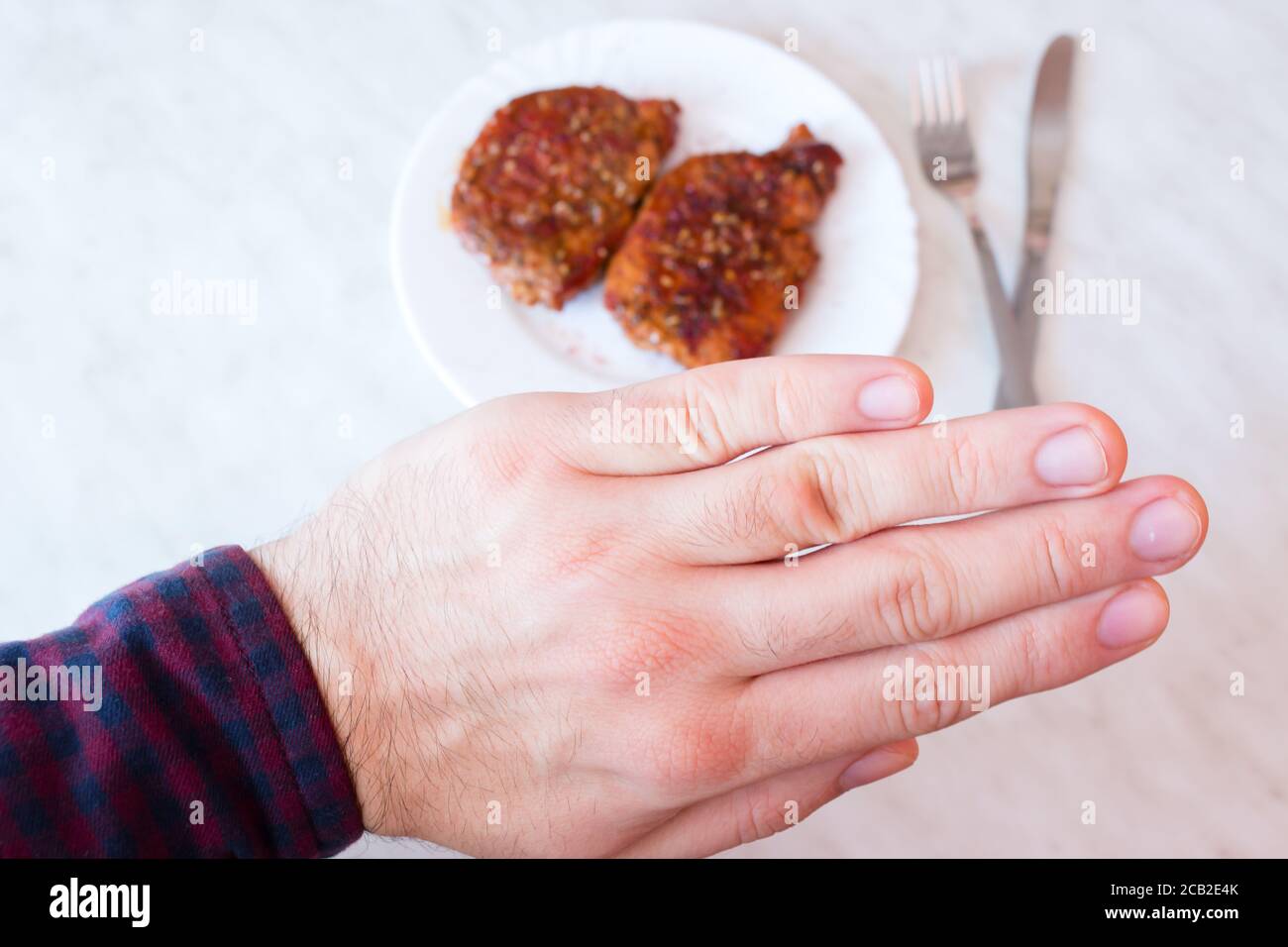vegan refuses meat close up Stock Photo - Alamy