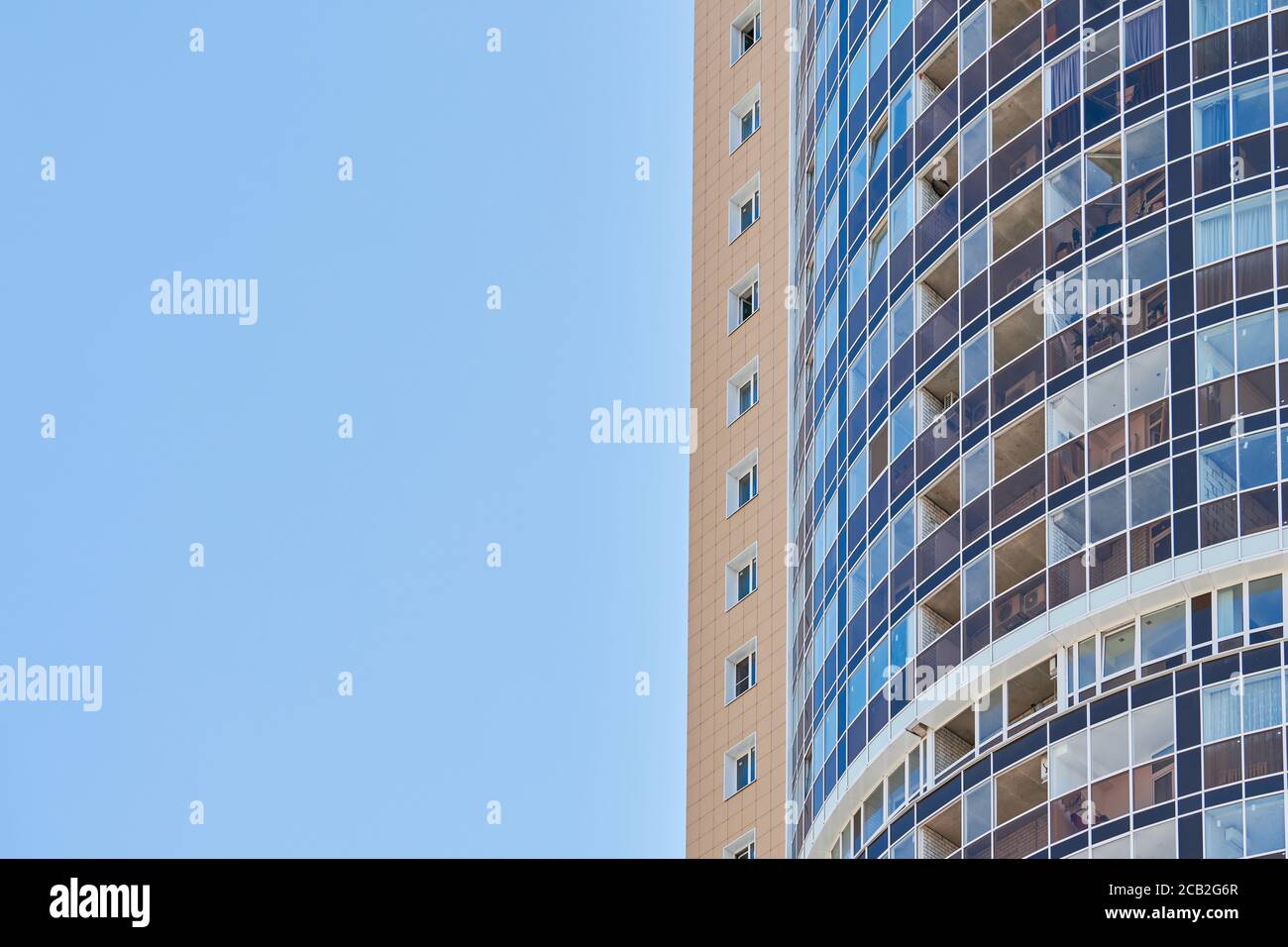 Multistorey building for rent, copy space. Multi-storey facade, living ...