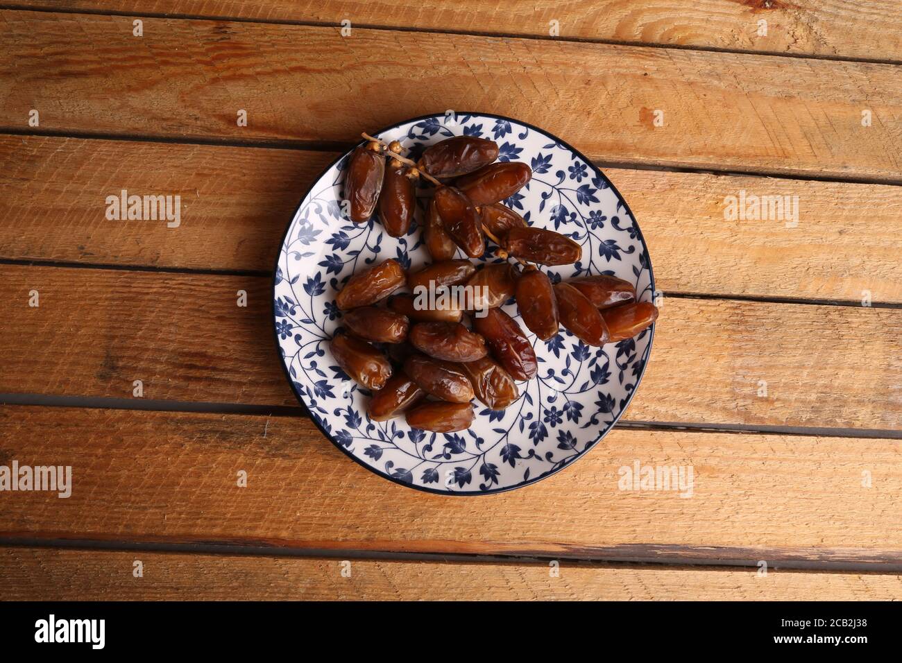 Top view of a plate of a fruit similar to raisins called dates Stock ...