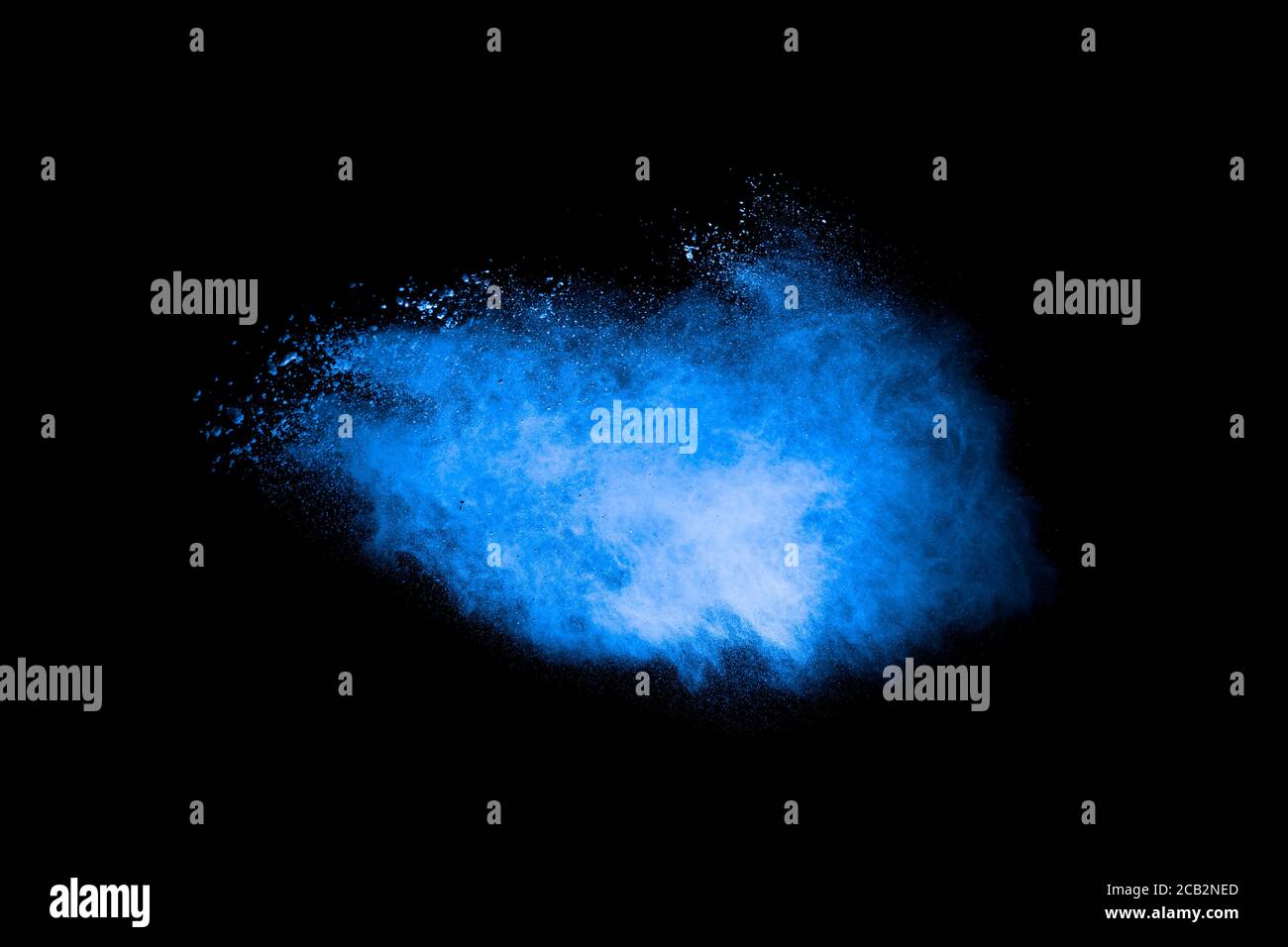 Blue color dust particles explosion cloud on black background.Color ...
