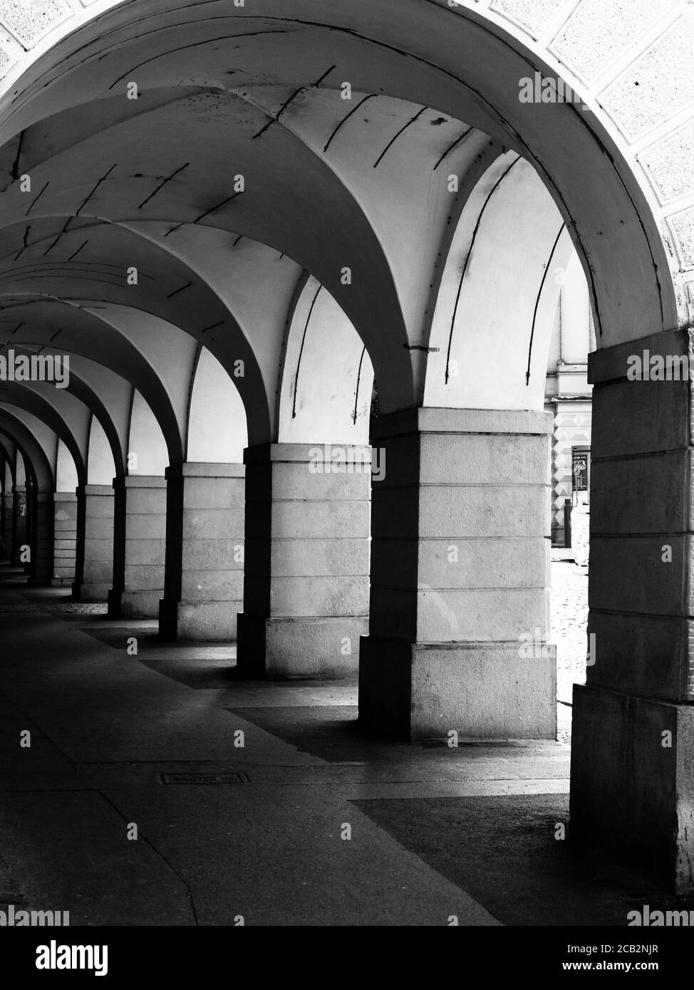 Old town arcade in black and white Stock Photo - Alamy