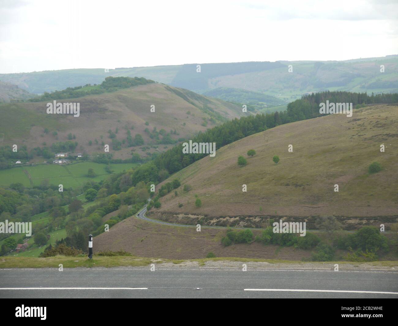 Empty Road Running Through Hillsides in the UK Stock Photo - Alamy