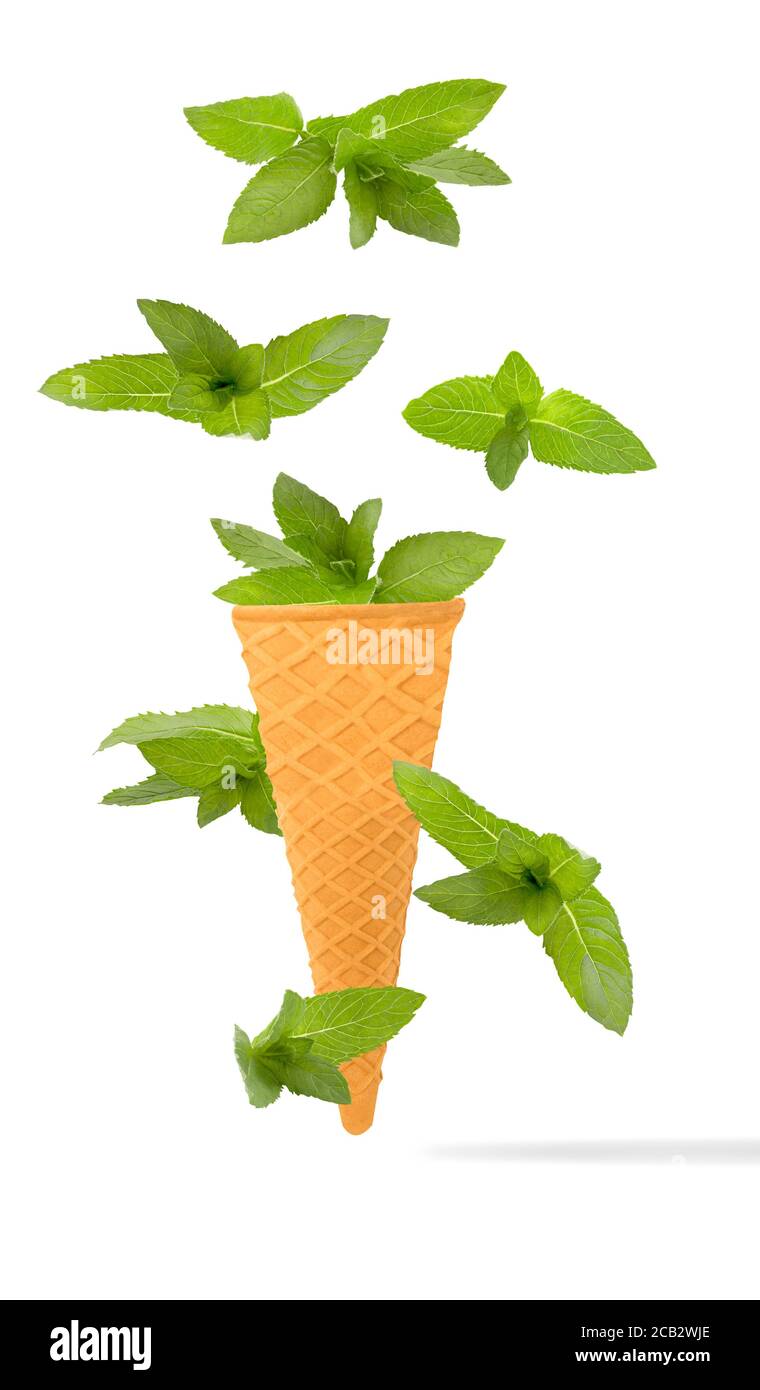 ice cream cones with ingredients falling in motion Stock Photo - Alamy