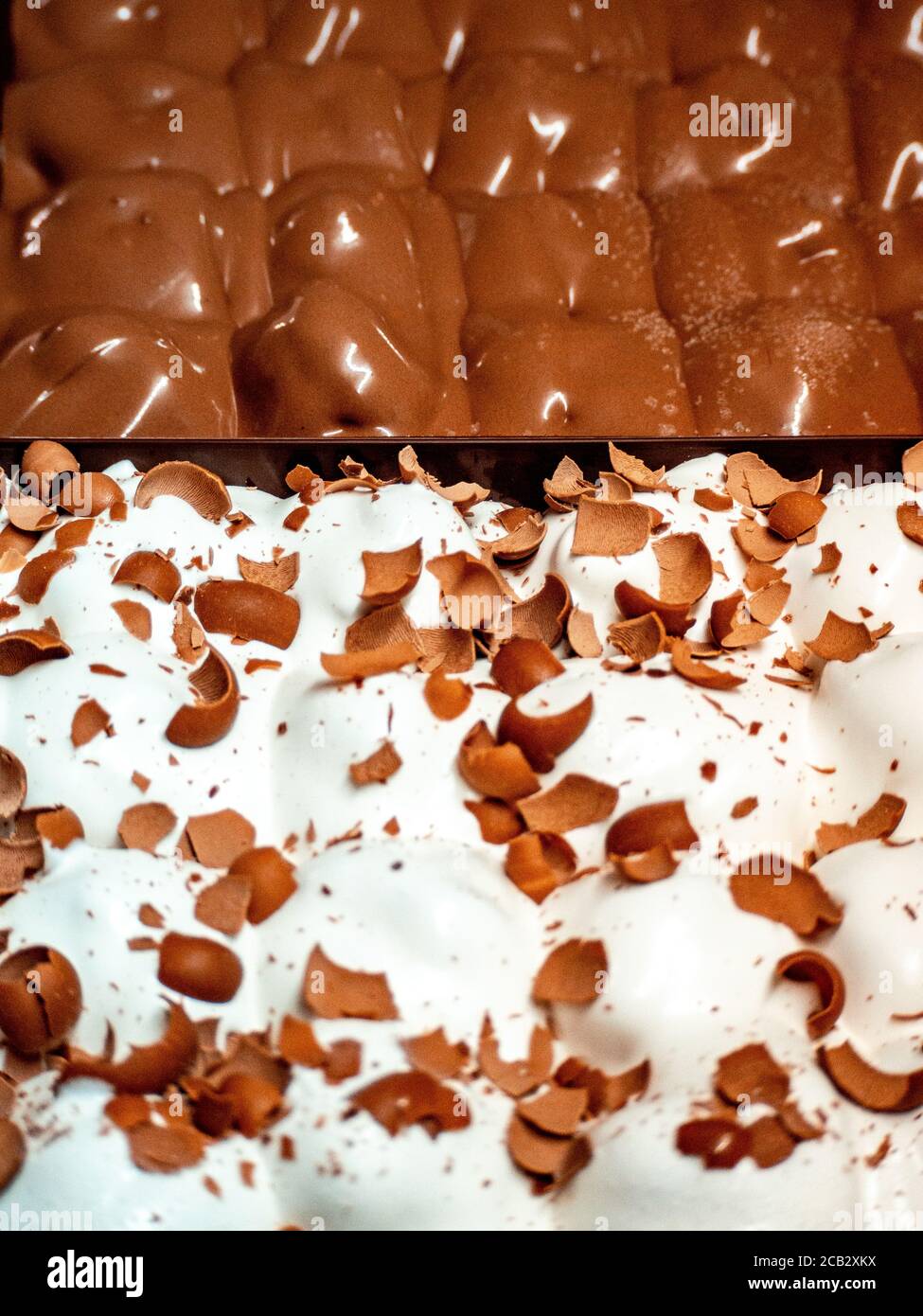 Vertical shot of bindi cake with white profiteroles Stock Photo - Alamy