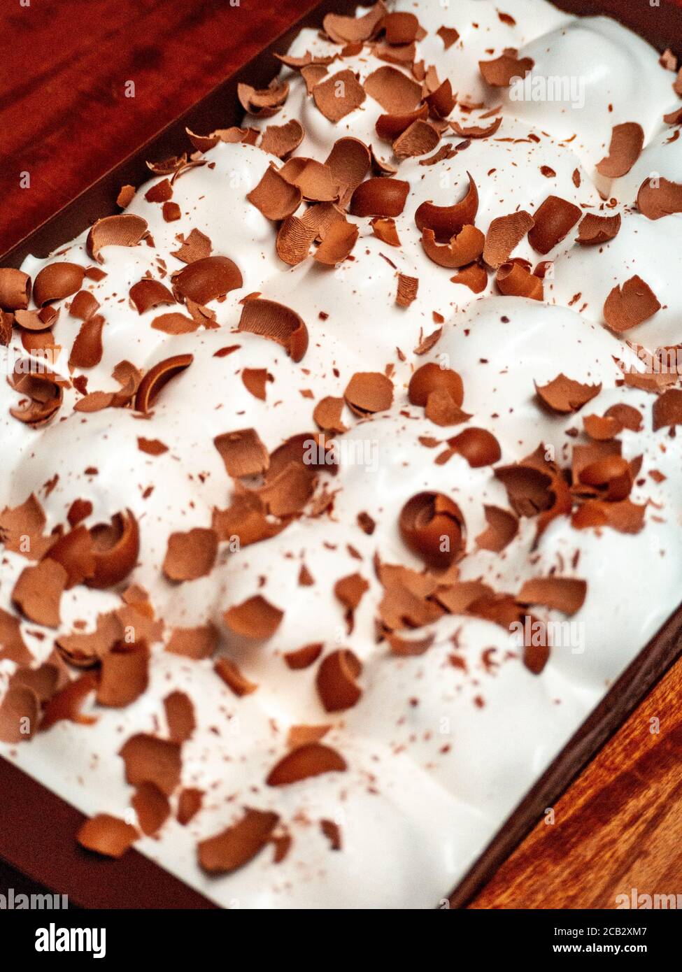 Vertical shot of bindi cake with white profiteroles Stock Photo - Alamy