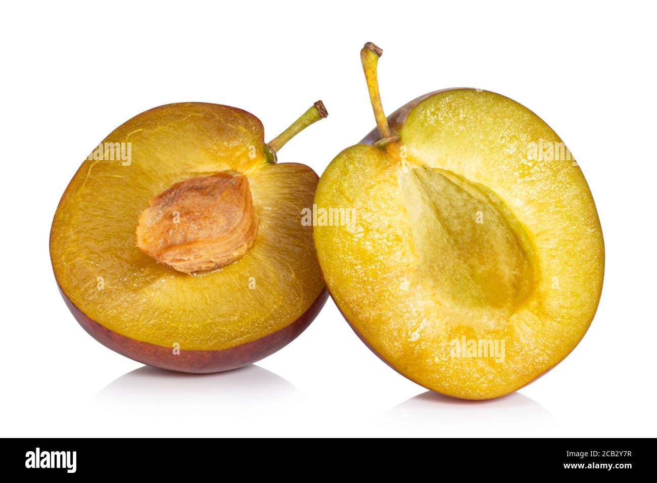 plums and a slice of plum isolated on white background Stock Photo - Alamy