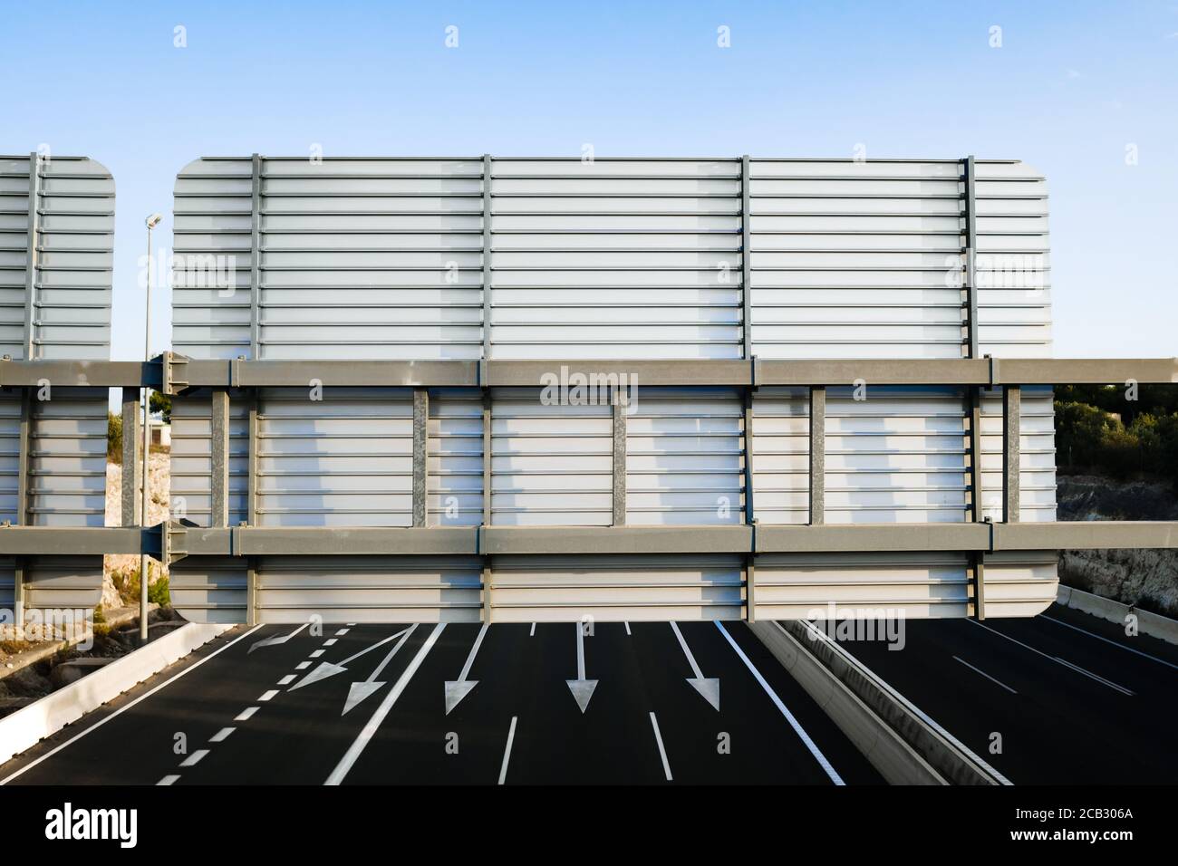 Backside of the signposts on a highway, on the asphalt forward ...