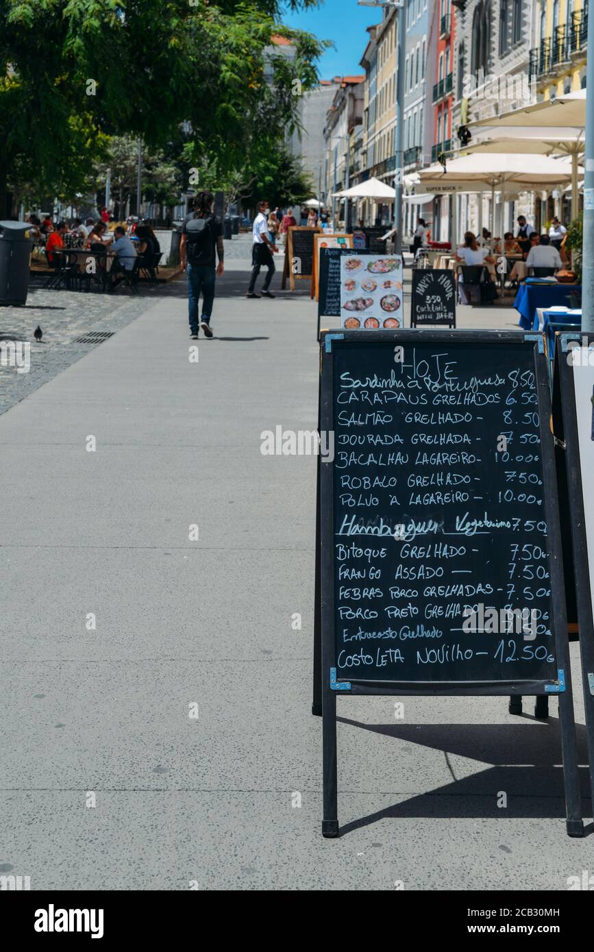 Traditional Portuguese Menu on Chalkboard outside Lisbon Restaurant ...