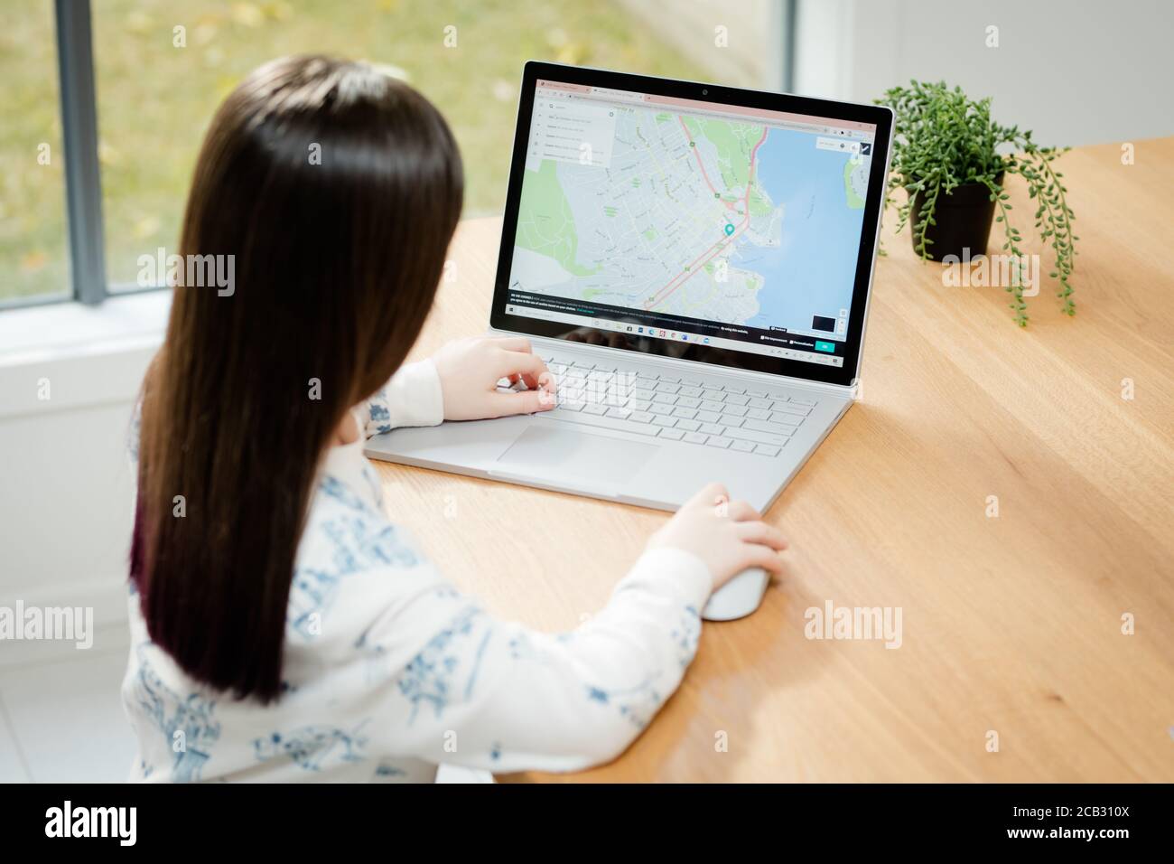 Child Uses a Computer for School Work Stock Photo - Alamy