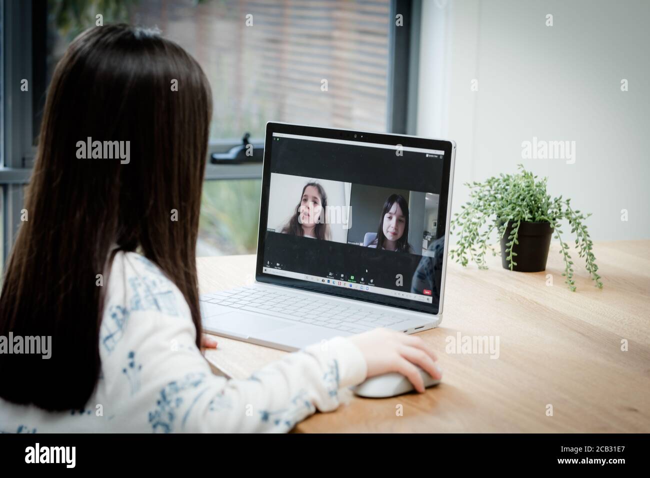 Child Uses a Computer for School Work Stock Photo - Alamy
