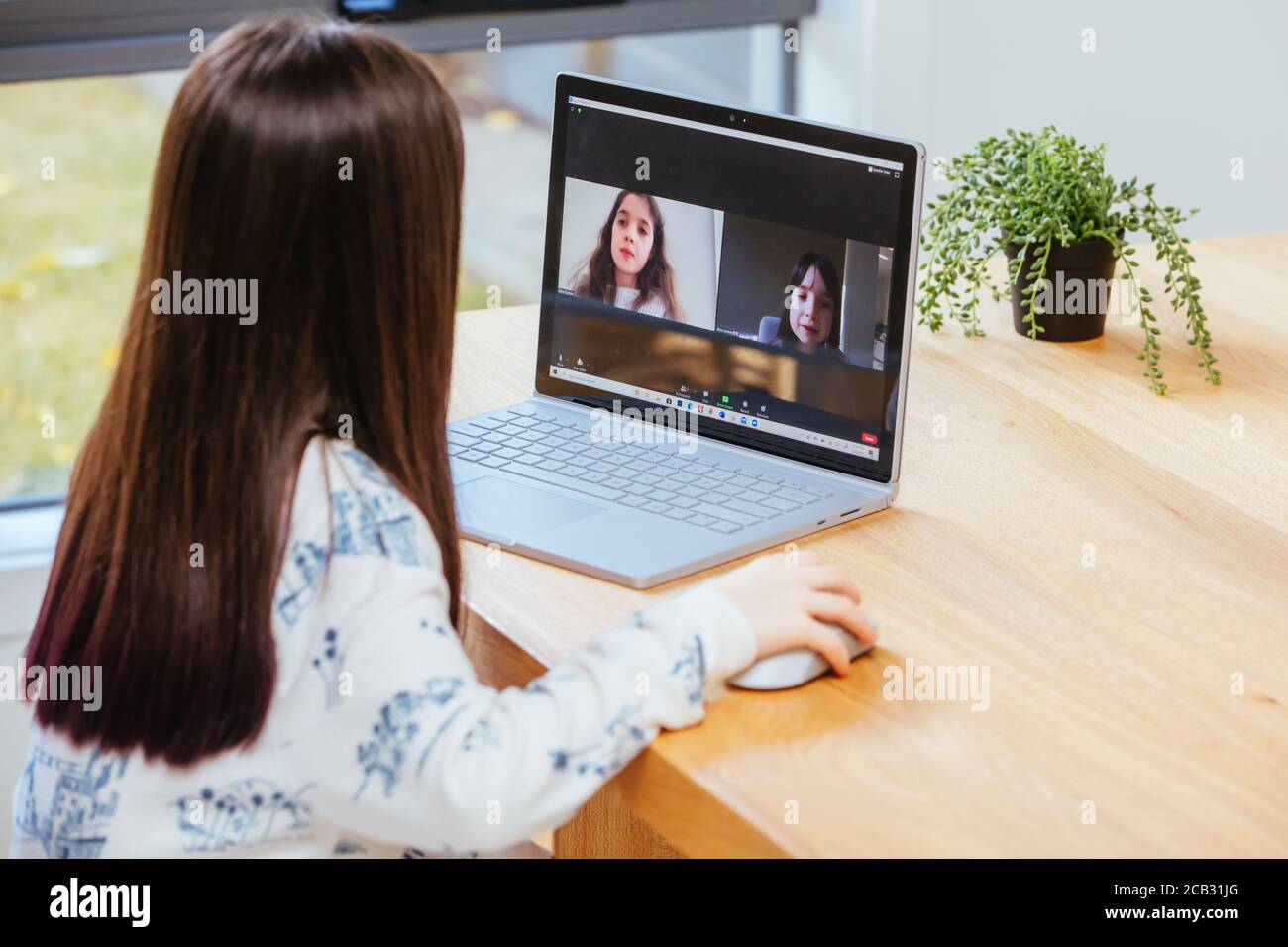 Child Uses a Computer for School Work Stock Photo - Alamy