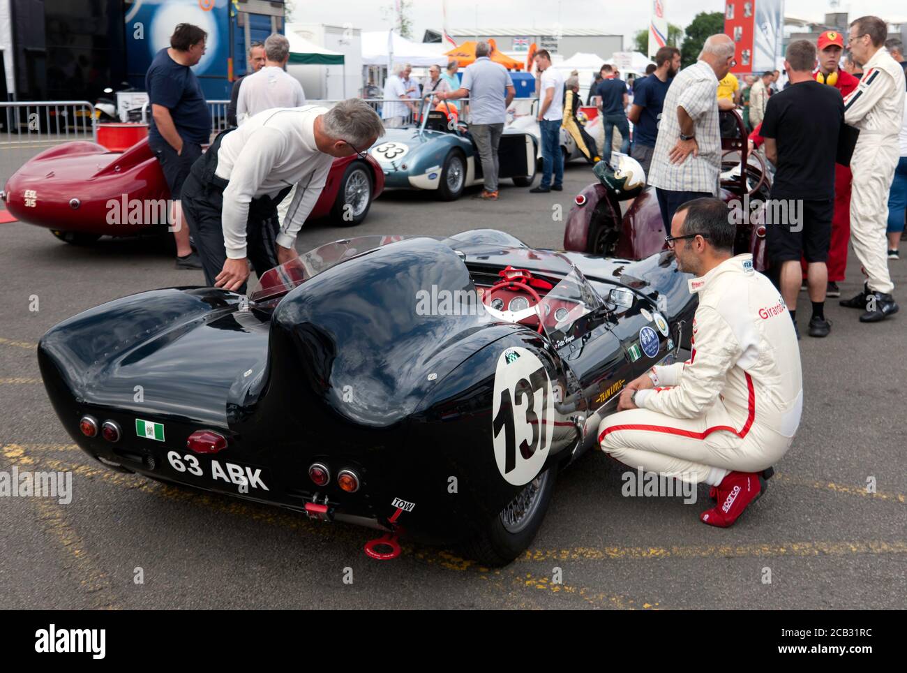 Max Girardo talking to Peter Haynes, in the cockpit of his 1959, Lotus ...