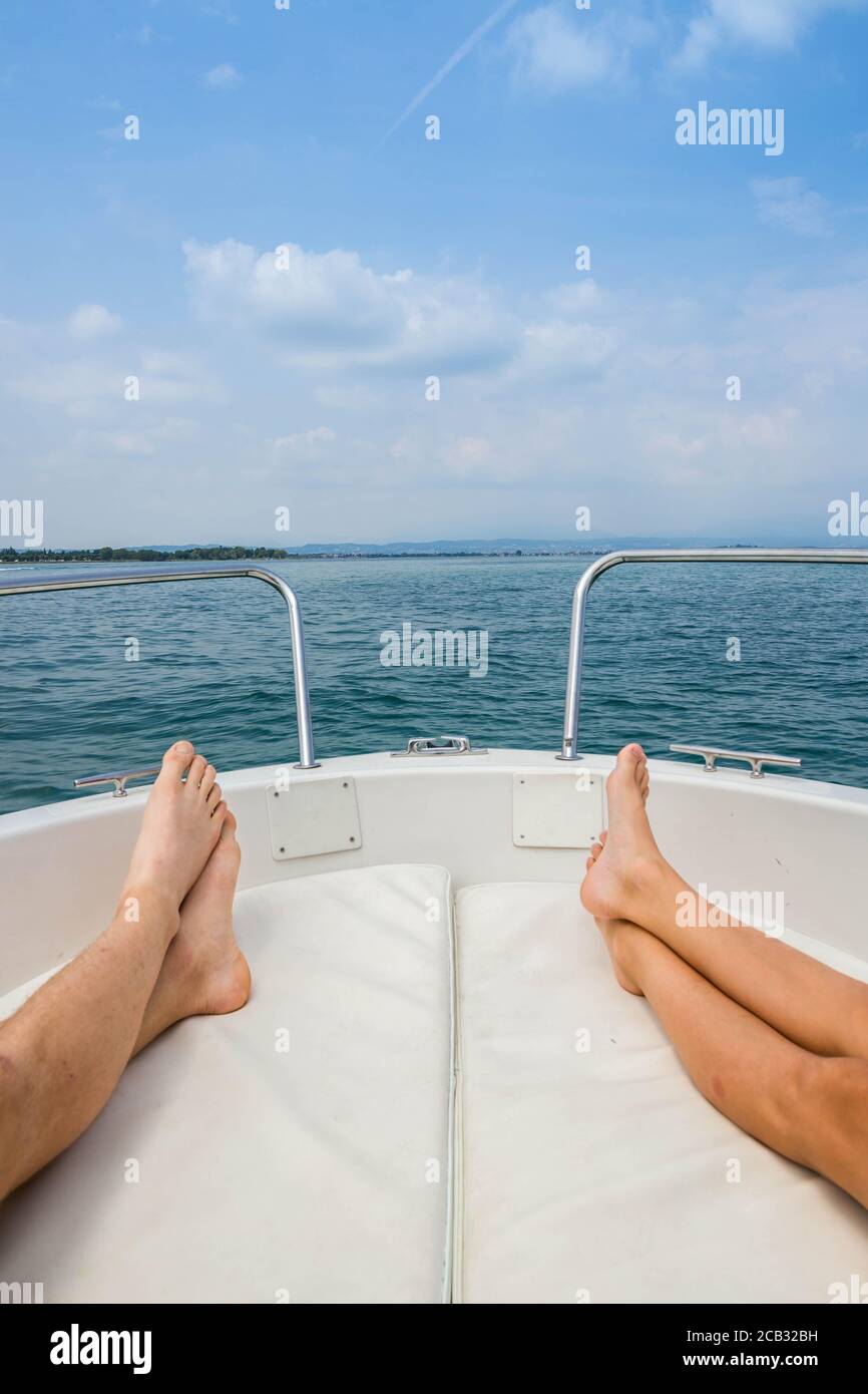 Human feet and boat hi-res stock photography and images - Alamy