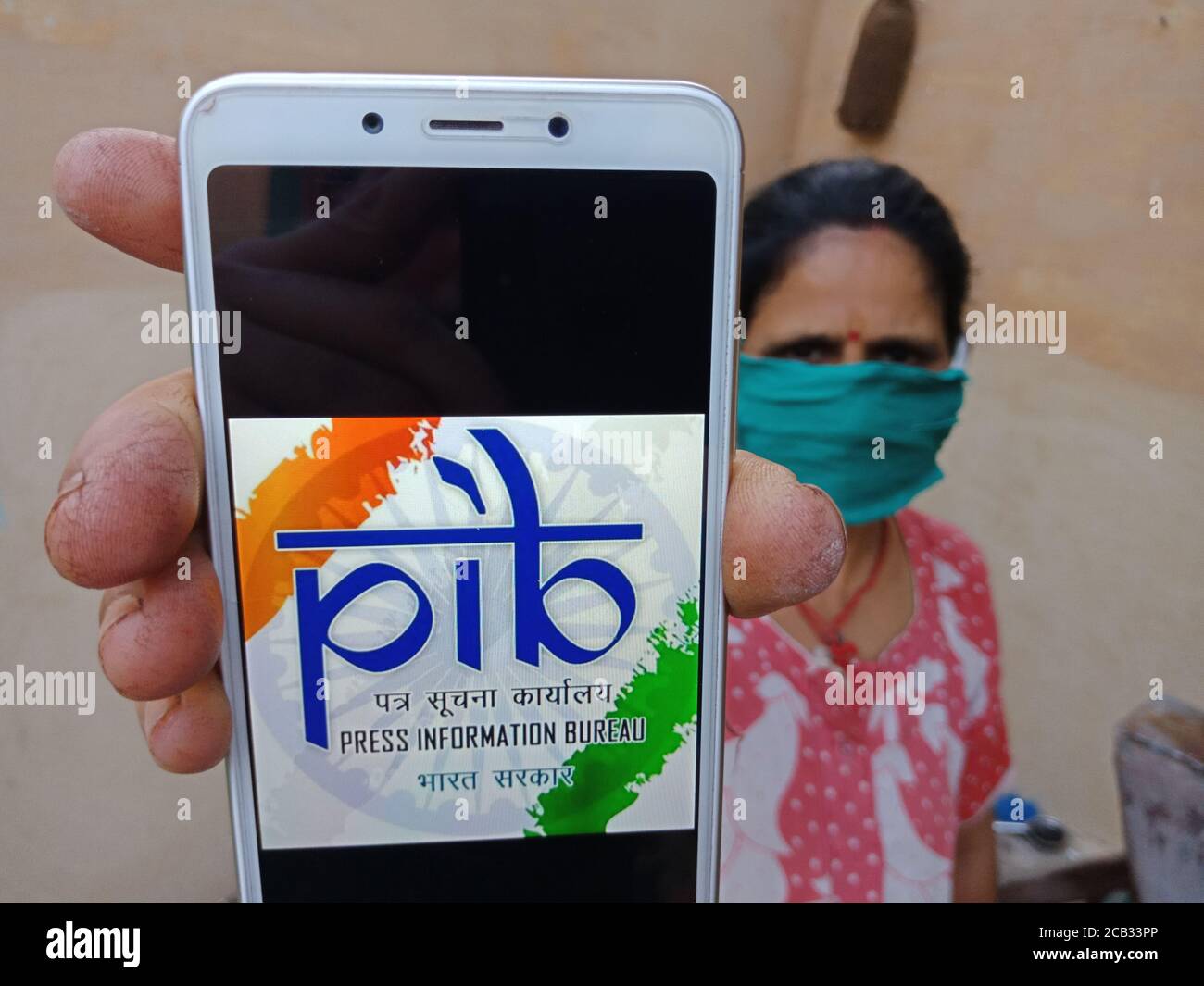 DISTRICT KATNI, INDIA - MAY 23, 2020: Woman holding smart phone with ...